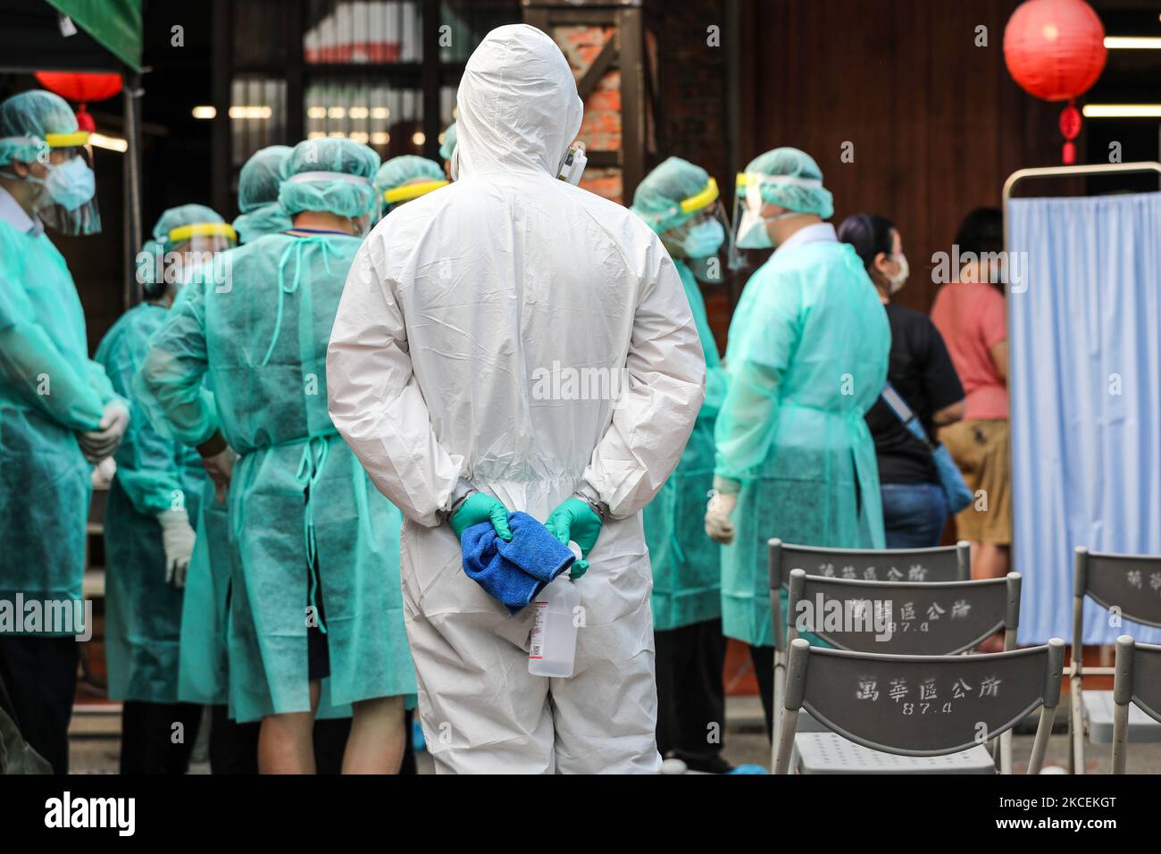 Taiwan Medical Staff decontaminating the provisory installed Covid-19 ...