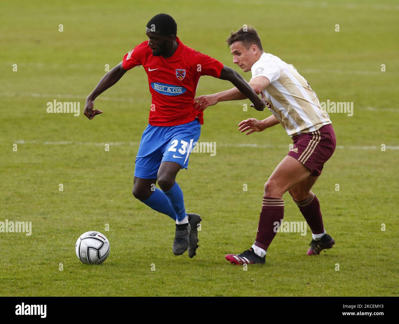 Dagenham & Redbridge's Saidou Khan holds o0f Kieran Green of FC Halifax ...