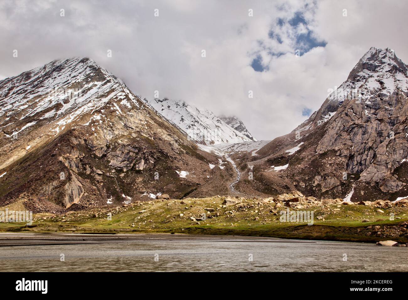Himalayan mountains surround glacial lake in a remote valley in Zanskar ...