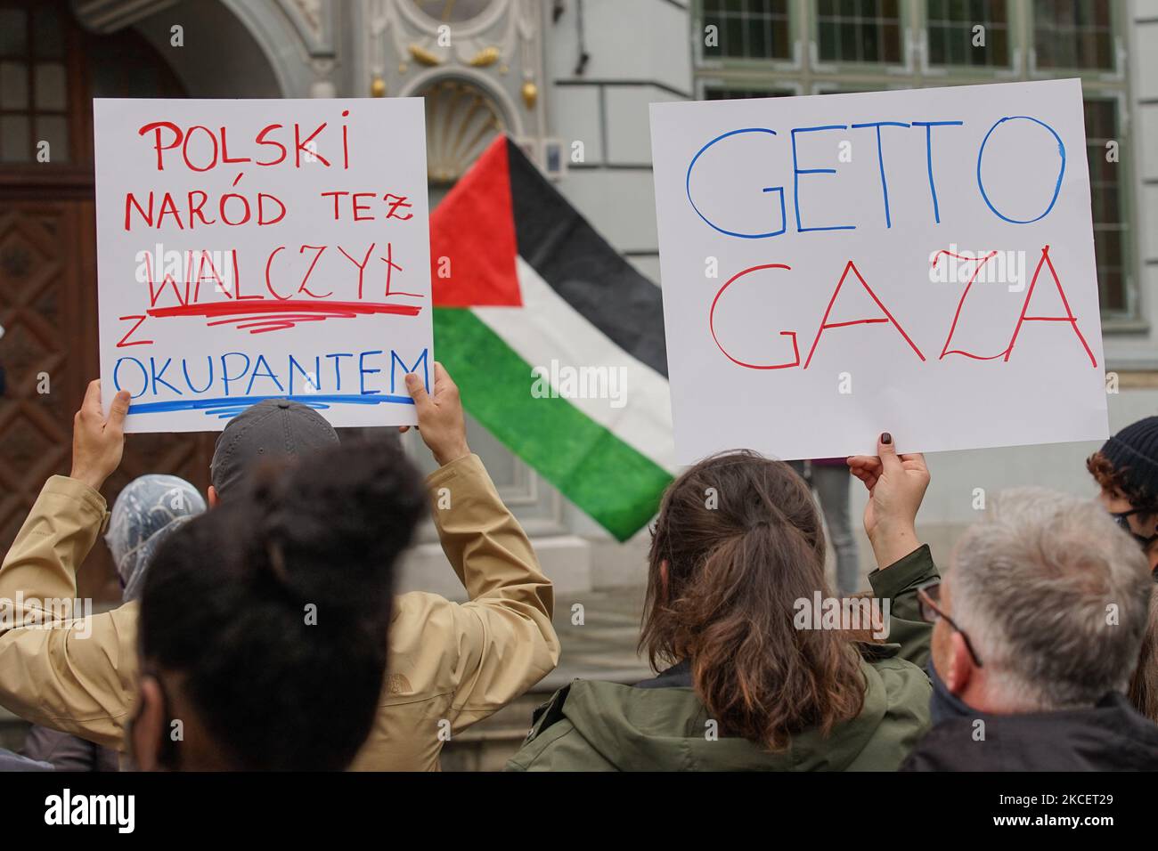 Protesters with pro-Palestinian banners and flags of Palestina are seen ...