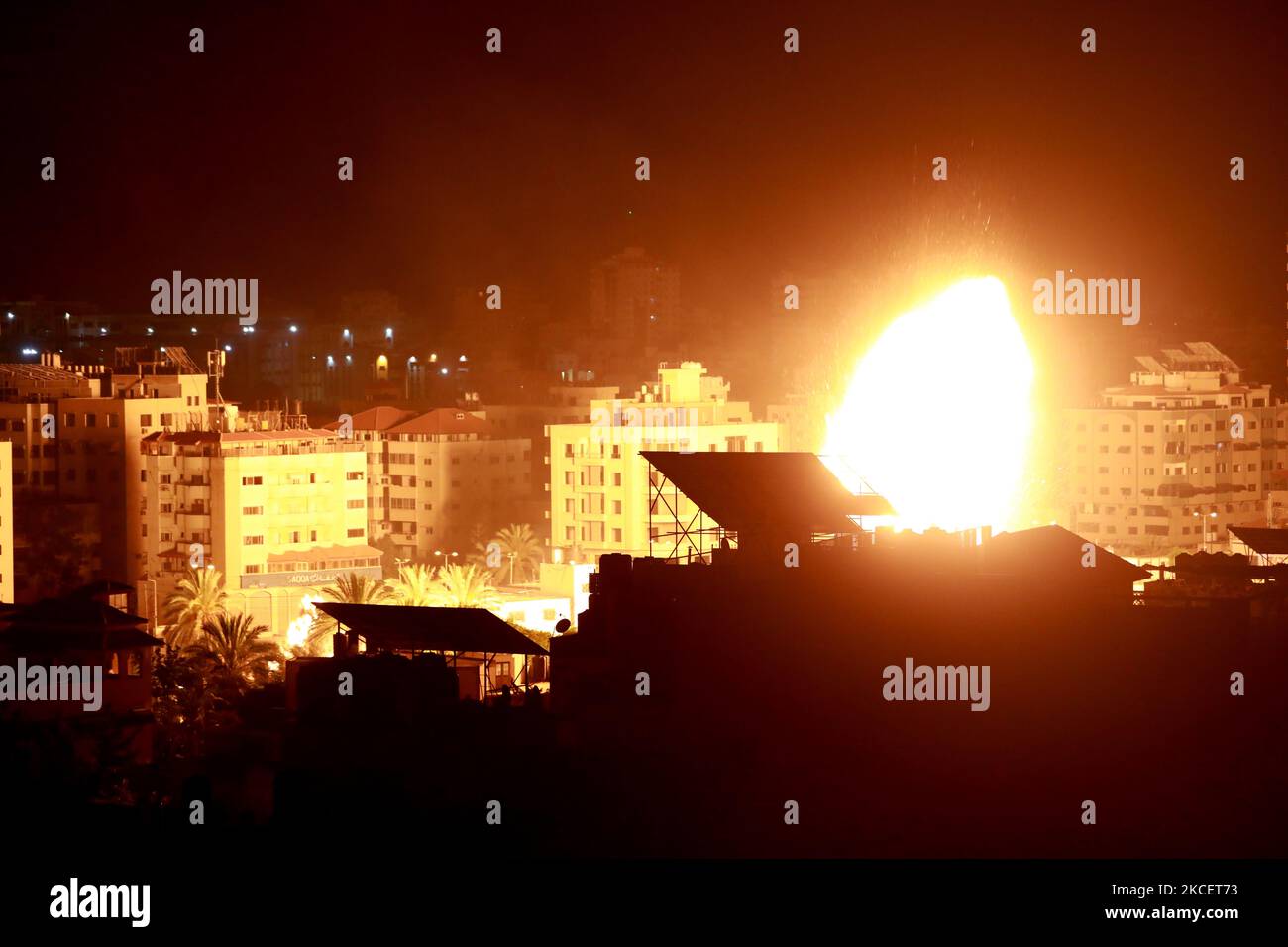 Fire and smoke rise above buildings in Gaza City as Israeli warplanes ...