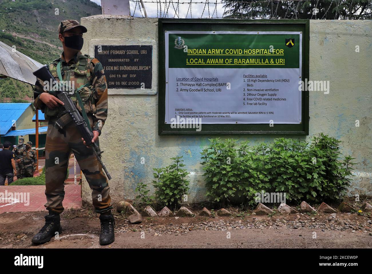 An Indian Army Jawan Stands Guard outside a School turned COVID-19 ...