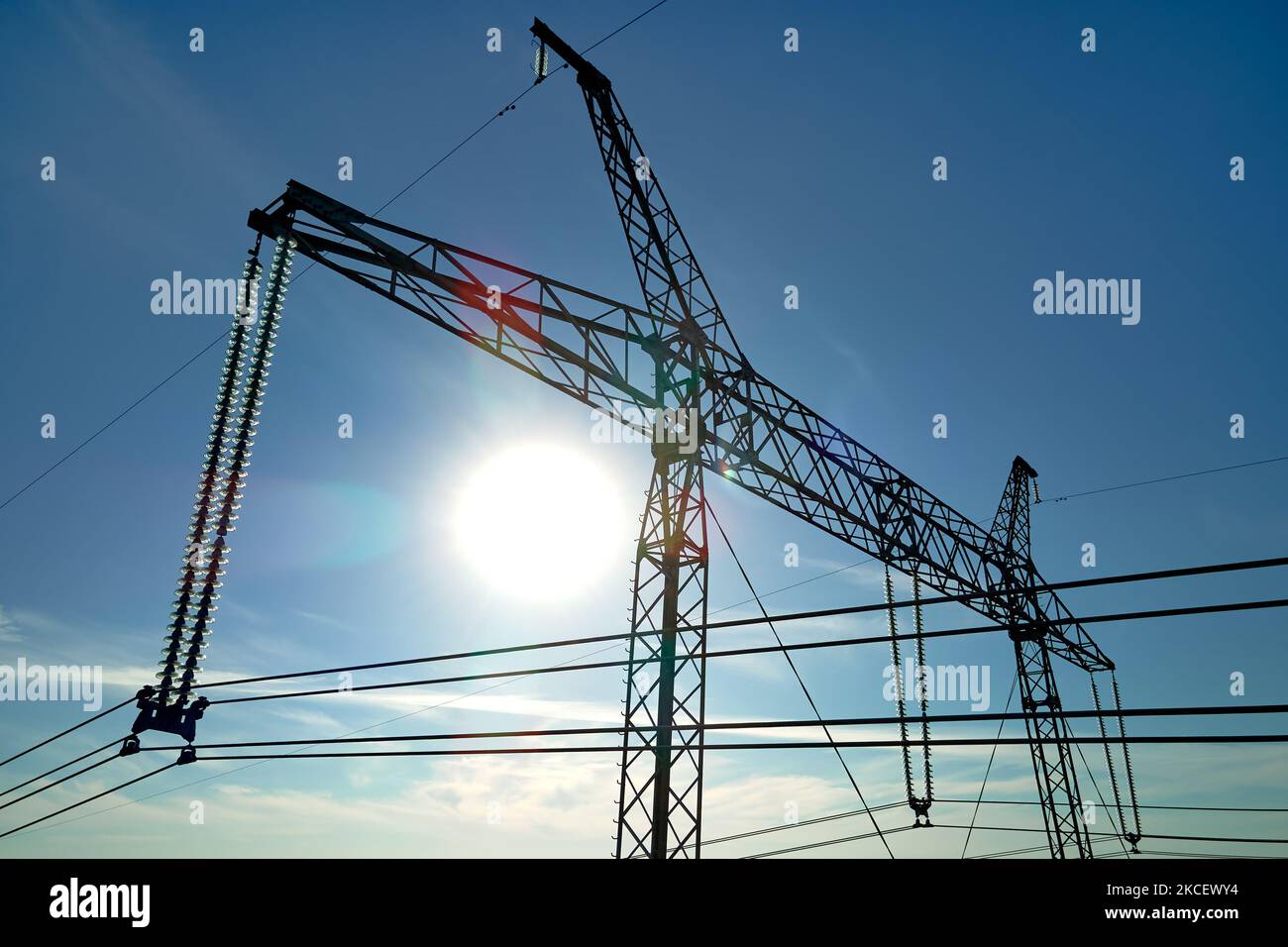 High voltage tower with electric power lines transfening electrical ...