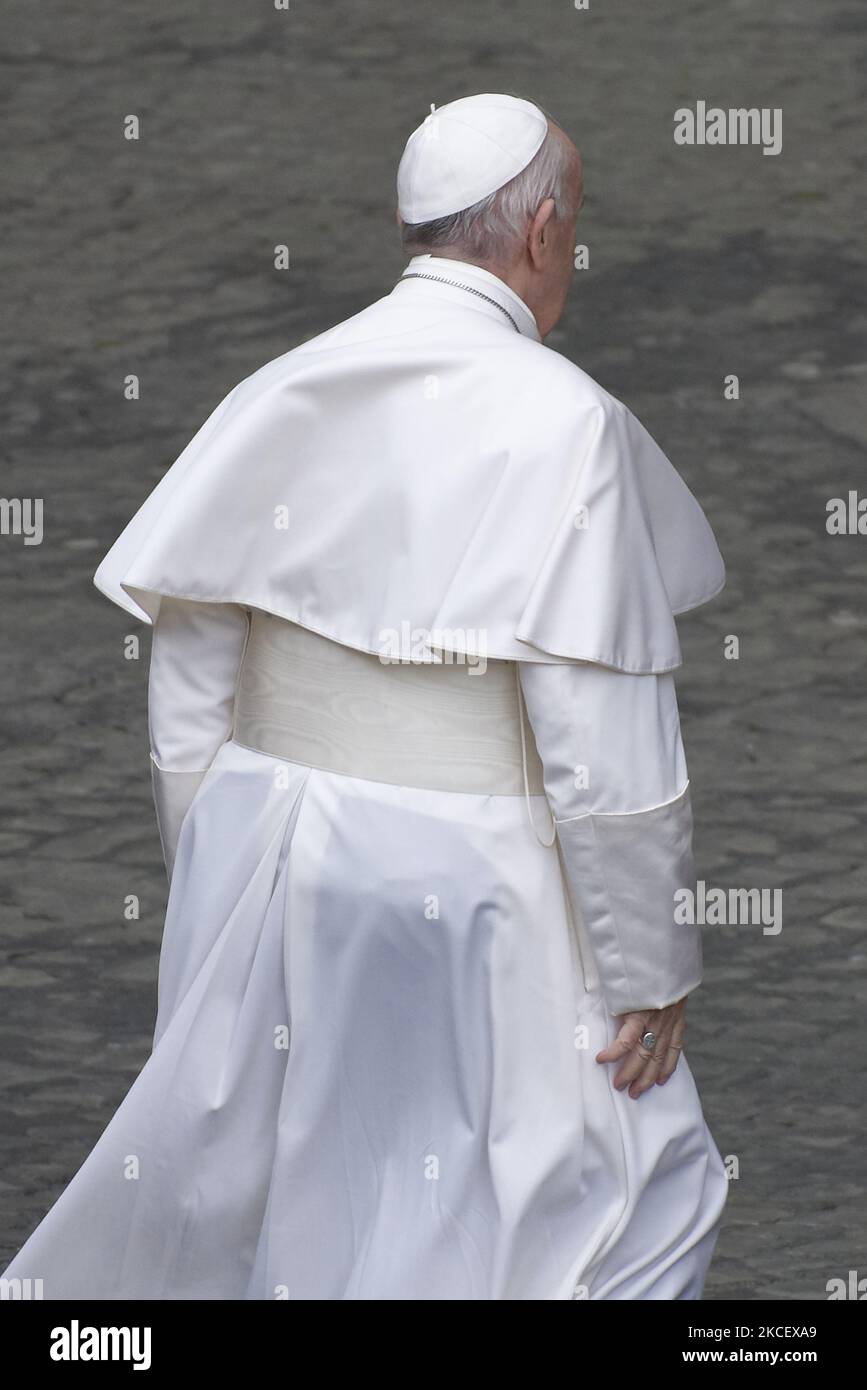 Pope Francis leaves the St. Damaso Courtyard at the Vatican at the end ...
