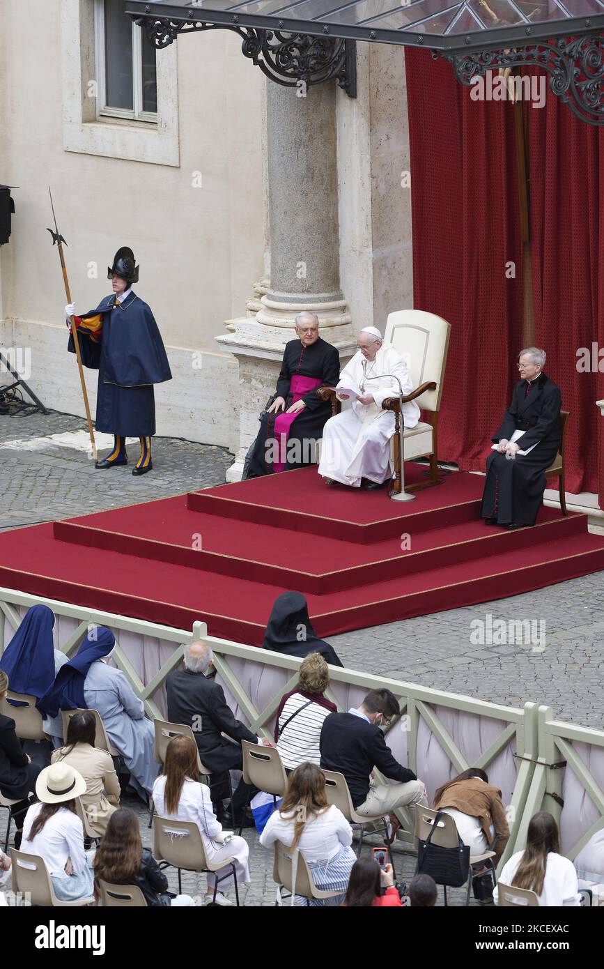Pope Francis sits in the St. Damaso Courtyard at the Vatican for his ...