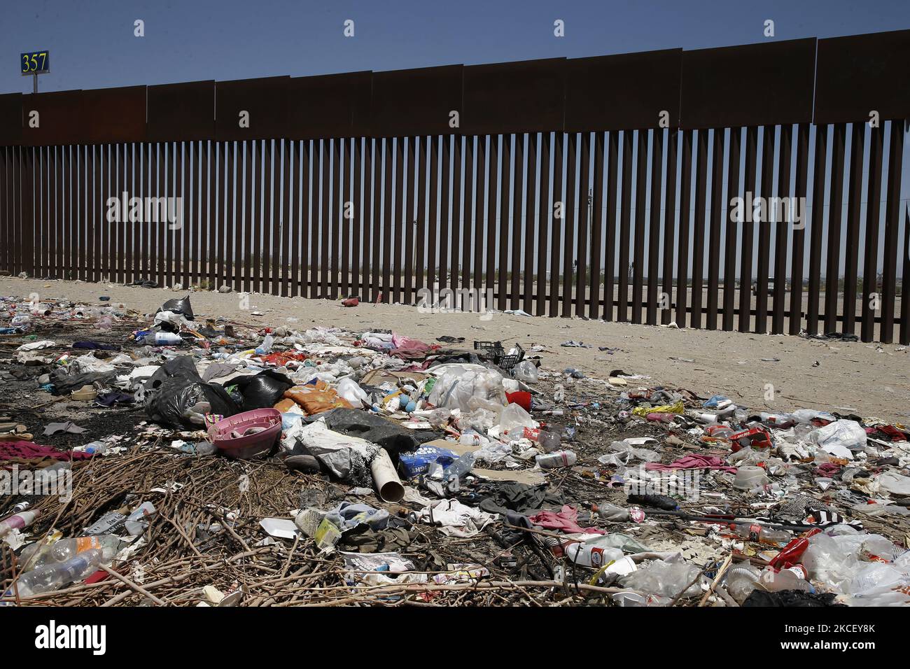 Trash is seen near the US Border Wall along Rio Bravo on May 19,2021 in ...