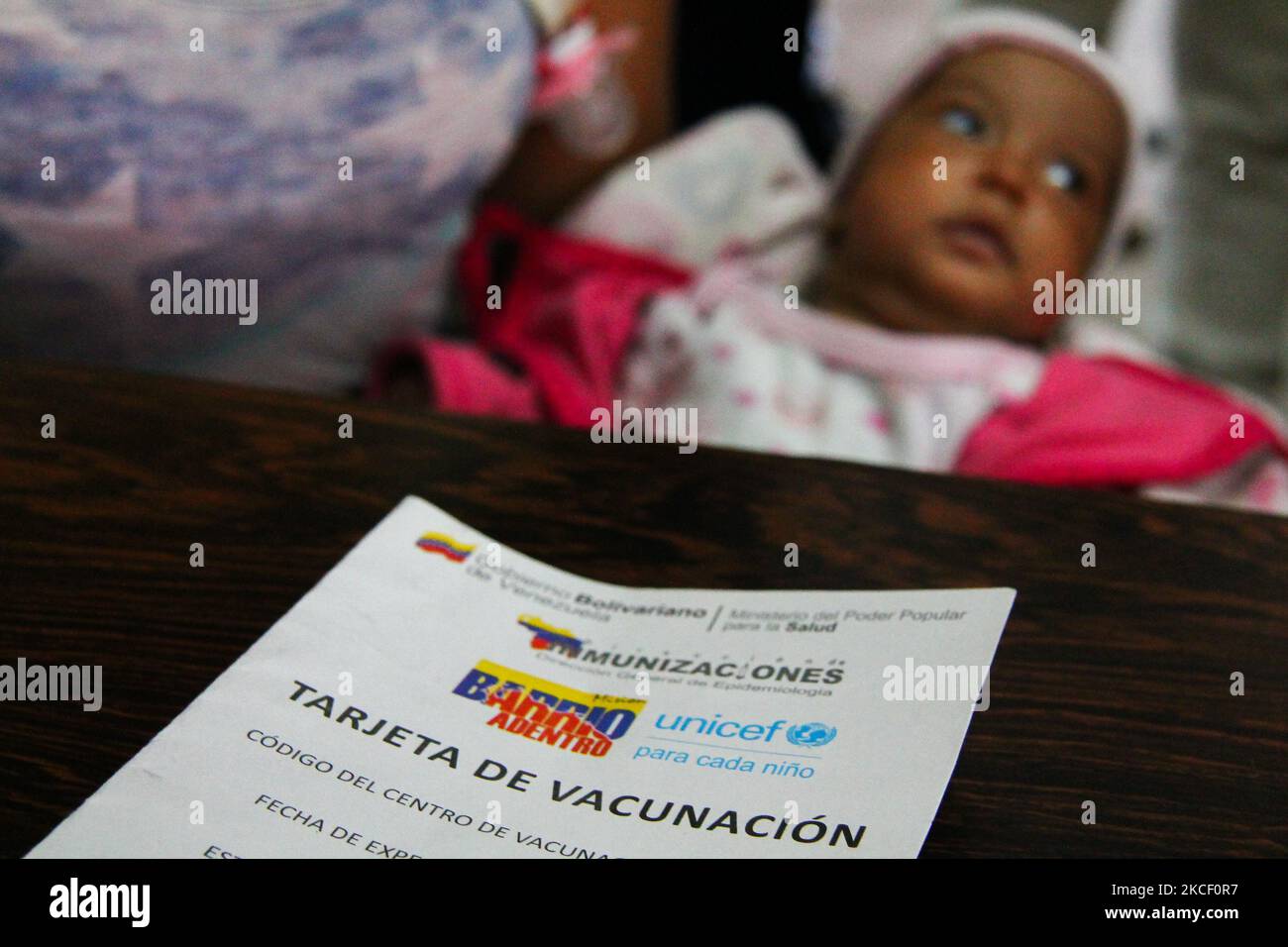 Detail of a vaccination card at an immunization day during the ...