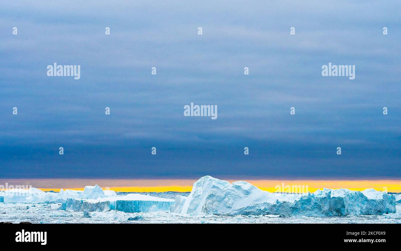 Icebergs near Ilulissat, Greenland. Climate change is having a profound ...