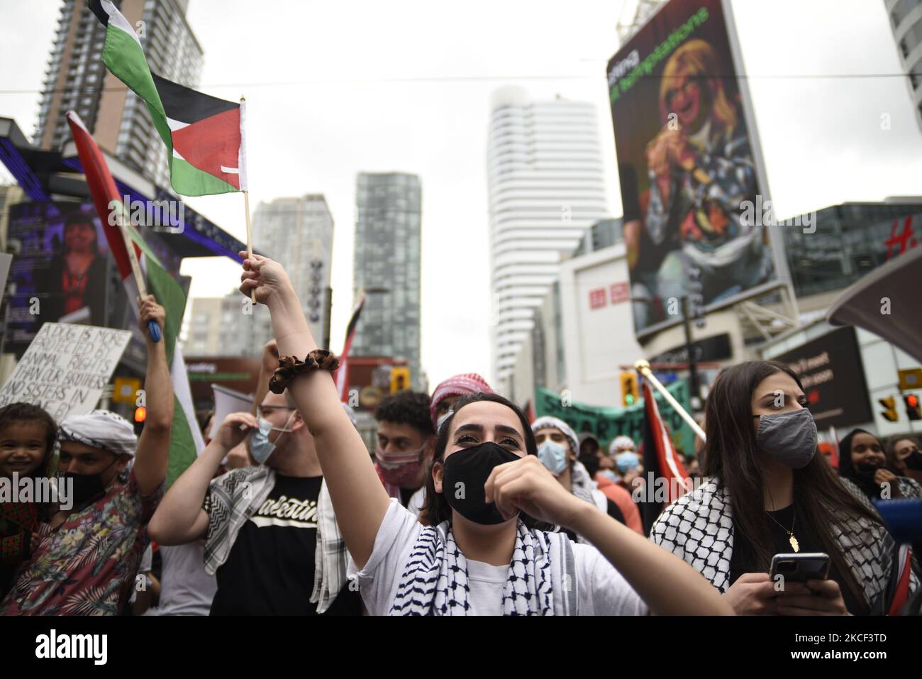 Pro Palestinian supporters gathered at Yonge and Dundas square in ...