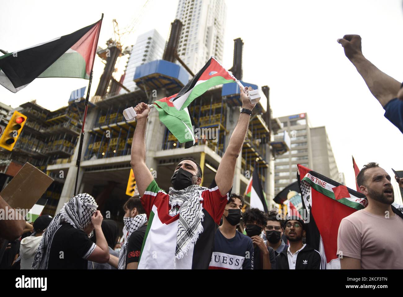 Pro Palestinian supporters gathered at Yonge and Dundas square in ...