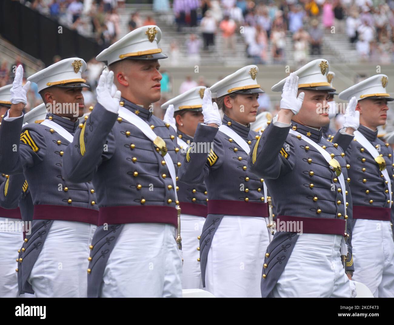 West Point graduates salute as U.S. Secretary of Defense Lloyd J ...