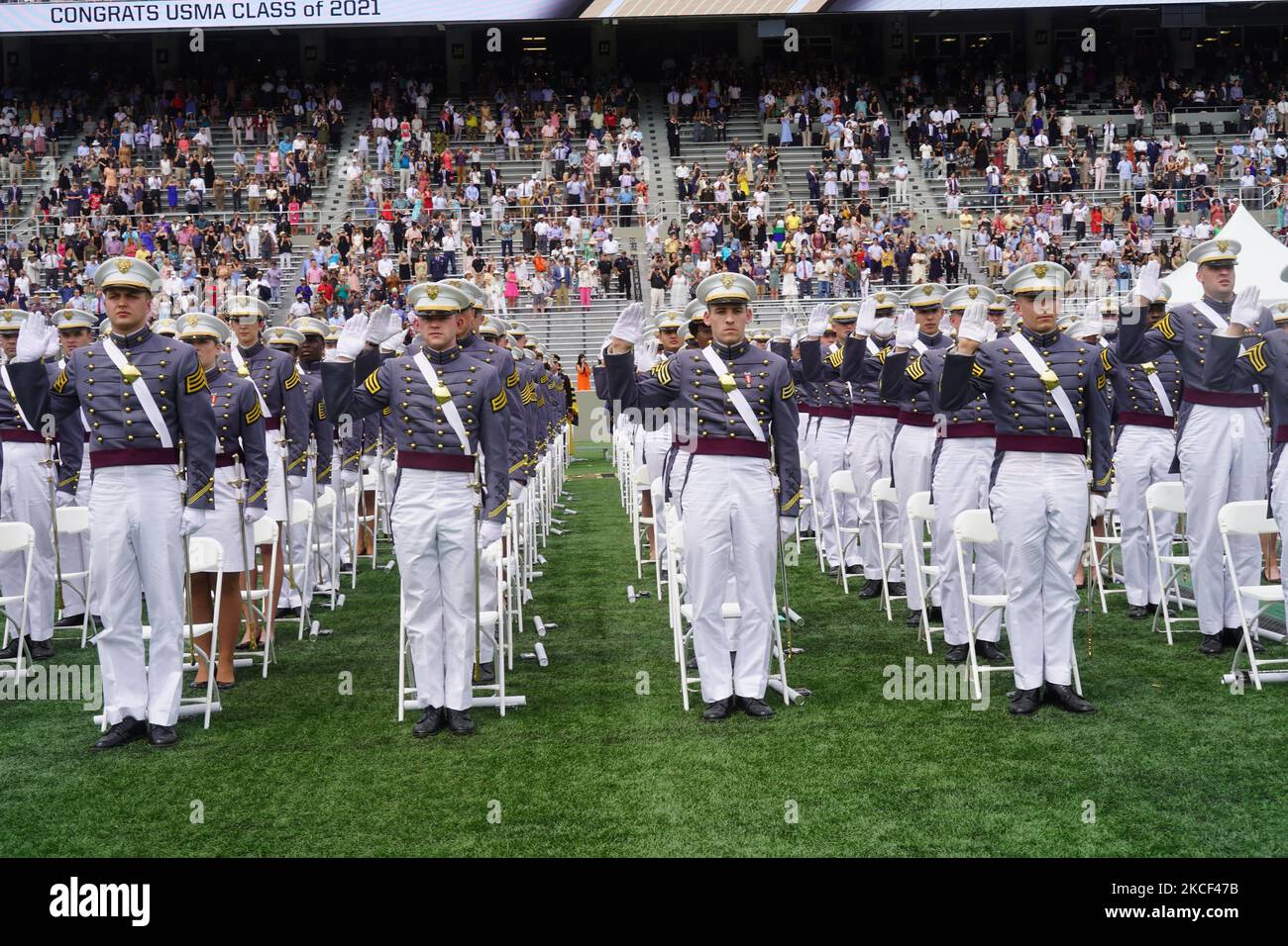 West Point graduates salute as U.S. Secretary of Defense Lloyd J ...