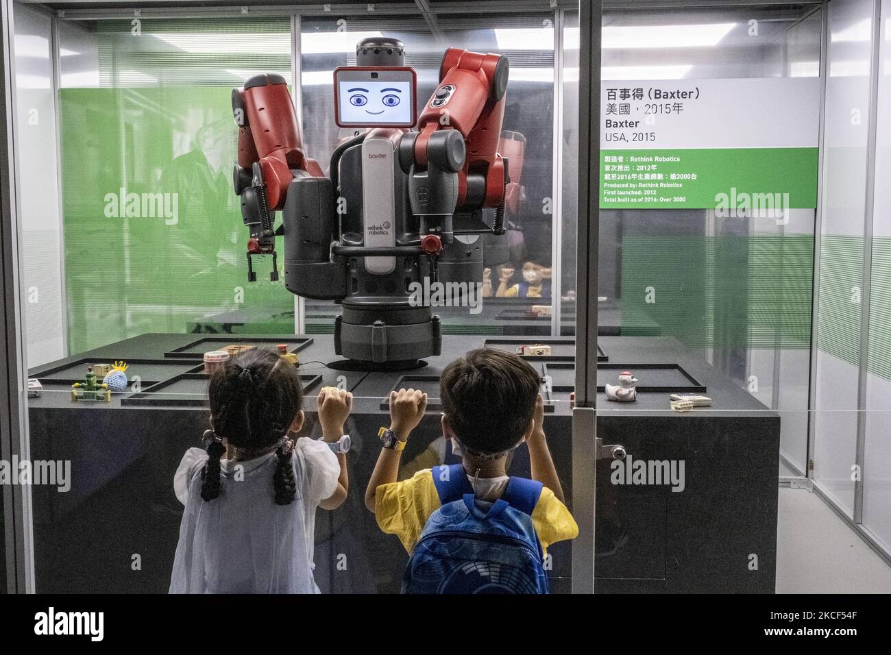 Visitors looks at a Robot on display at the “Robots, The 500-Year Quest ...