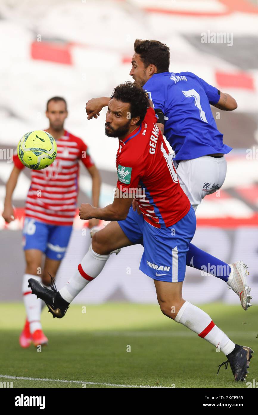 German Sanchez, of Granada CF and Jaime Mata, of Getafe CF during the ...