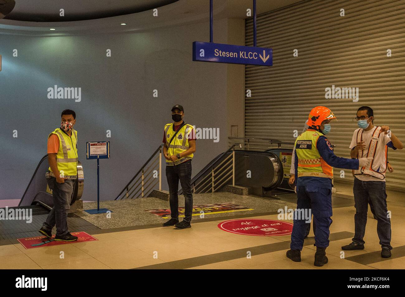 Authorities gather at KLCC station after an accident involving Kuala ...