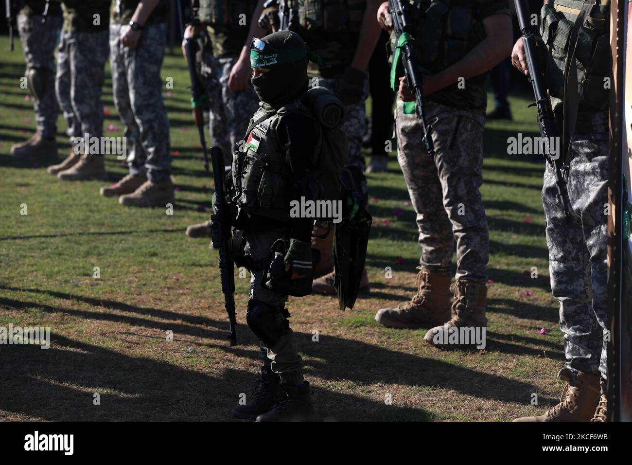Militants stand guard around the stage as Yahya Sinwar, the Palestinian ...