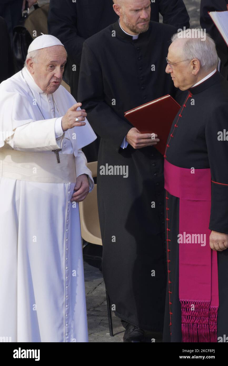 Pope Francis talks with Mons. Leonardo Sapienza, as he arrives in the ...