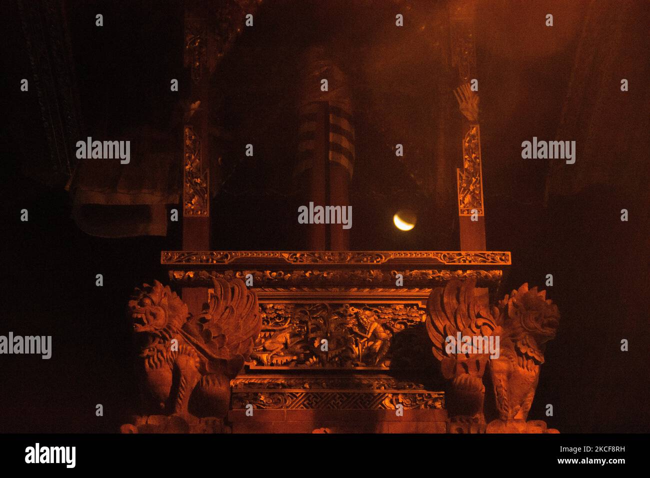 The moon eclipse is seen in Jimbaran, Bali, Indonesia, on May 26th 2021 ...