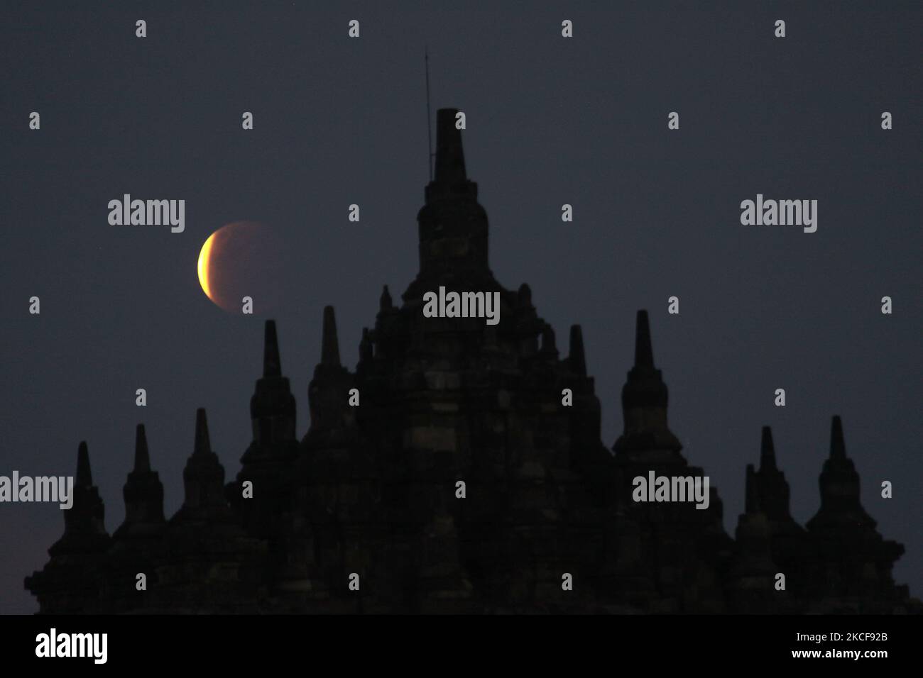 Super Blood Moon are seen above an ancient Plaosan Buddhist temple ...