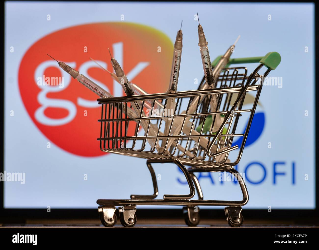 Medical syringes in the mini shopping trolley are seen in front of the ...