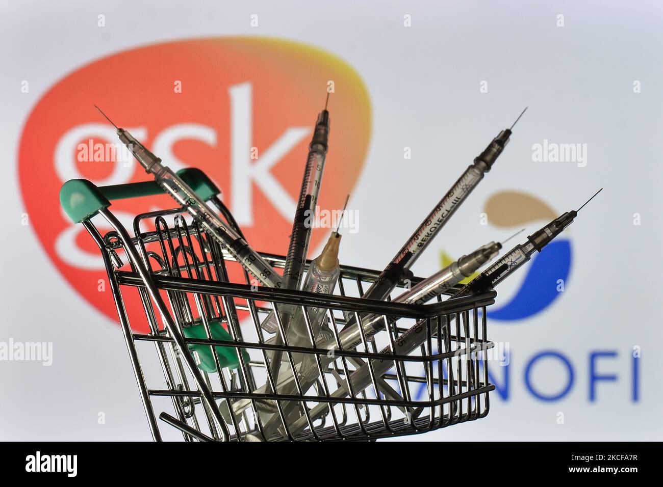 Medical syringes in the mini shopping trolley are seen in front of the ...
