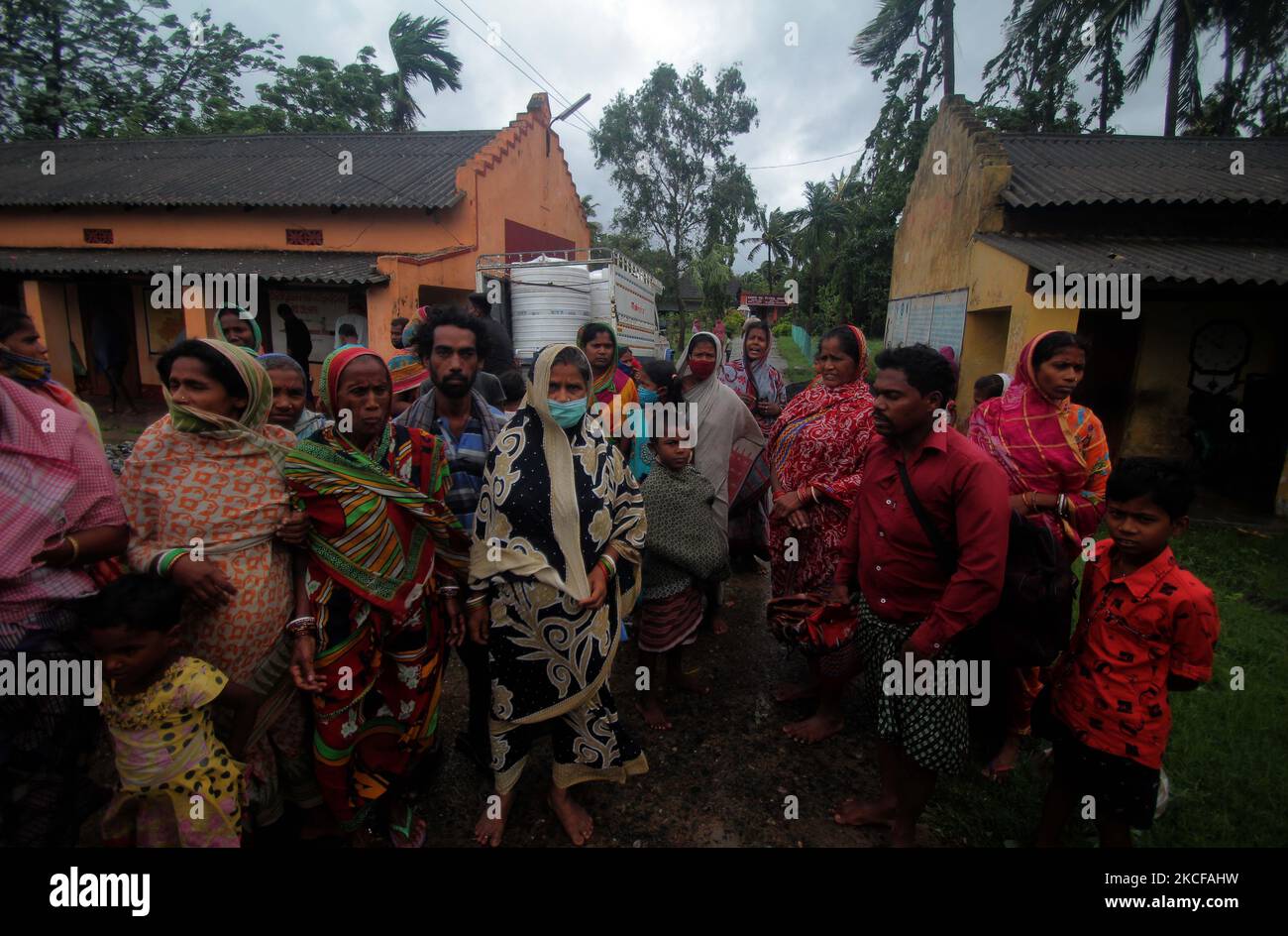 Coastal area villagers are seen at cyclone relief shelter and returns ...