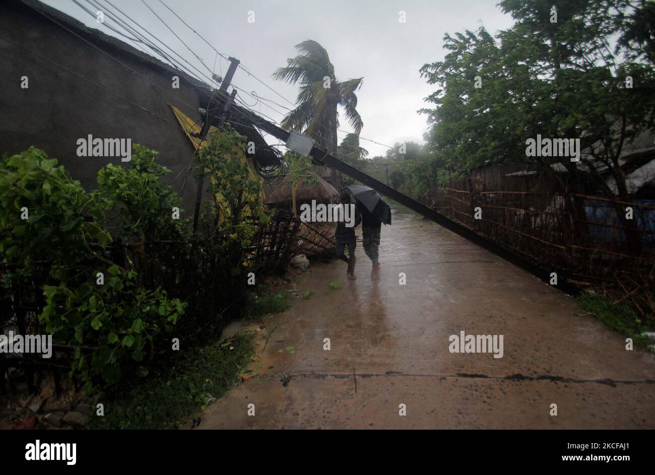 Coastal area villagers are seen at cyclone relief shelter and returns ...