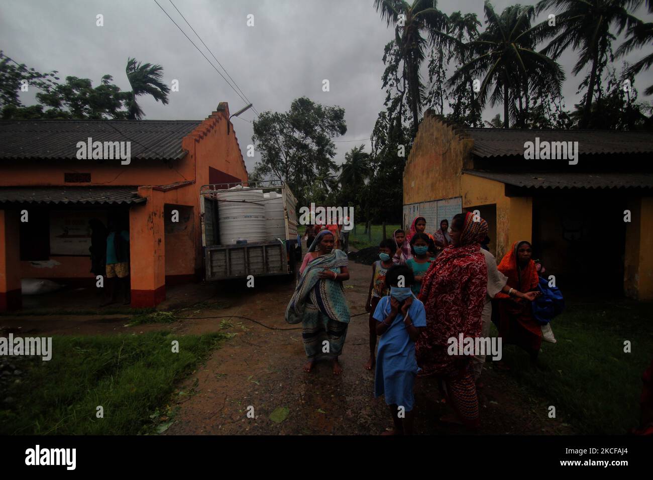 Coastal area villagers are seen at cyclone relief shelter and returns ...