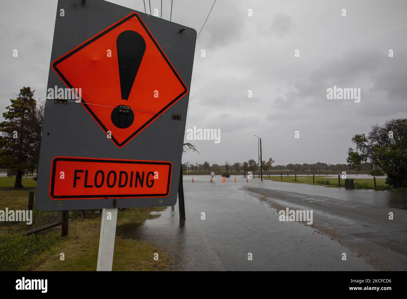 A flood warning sign is seen in New Brighton, Christchurch, NewÂ ...