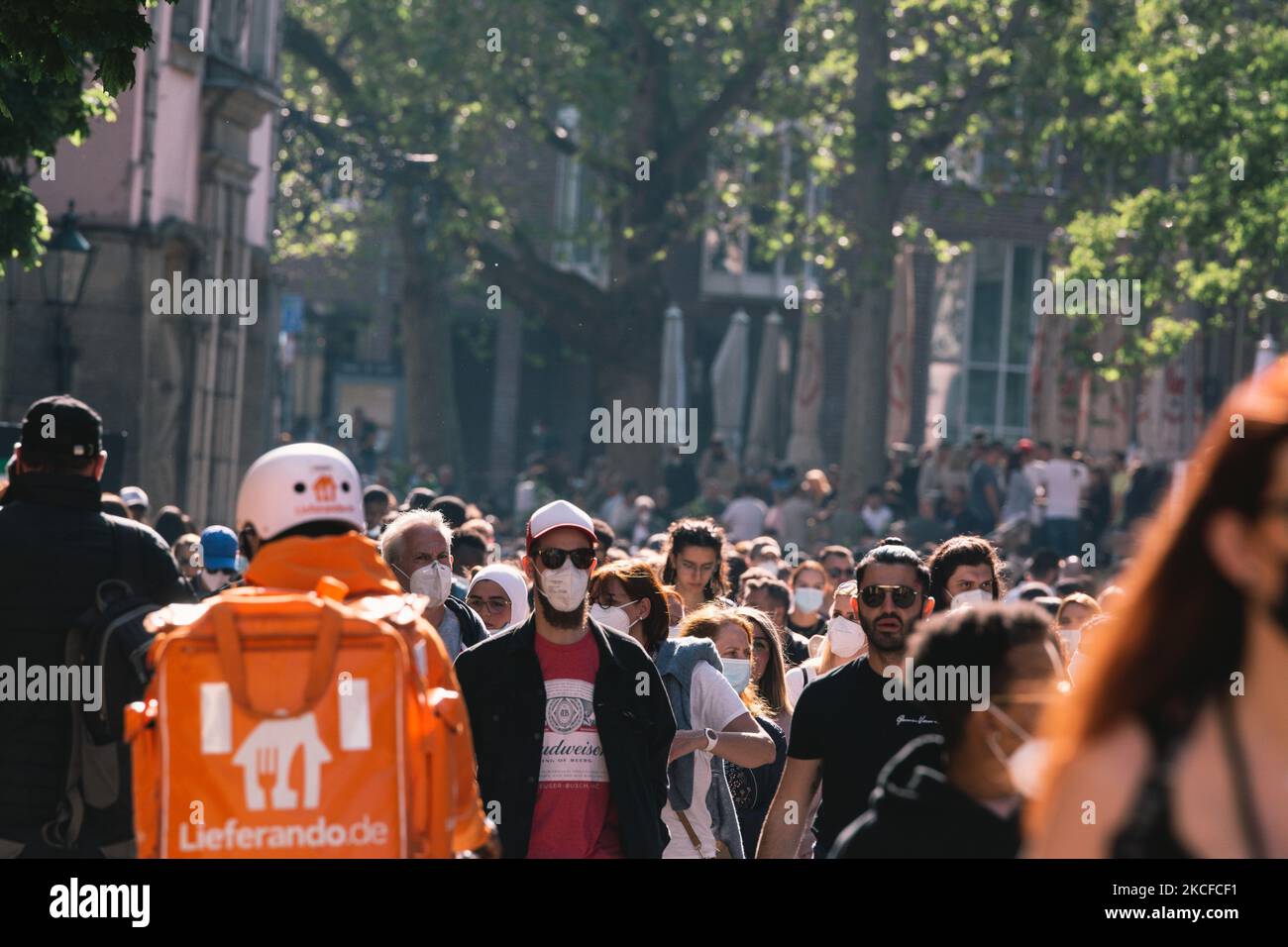 crowd of shoppers are seen in the city center of Duesseldorf, Germany ...