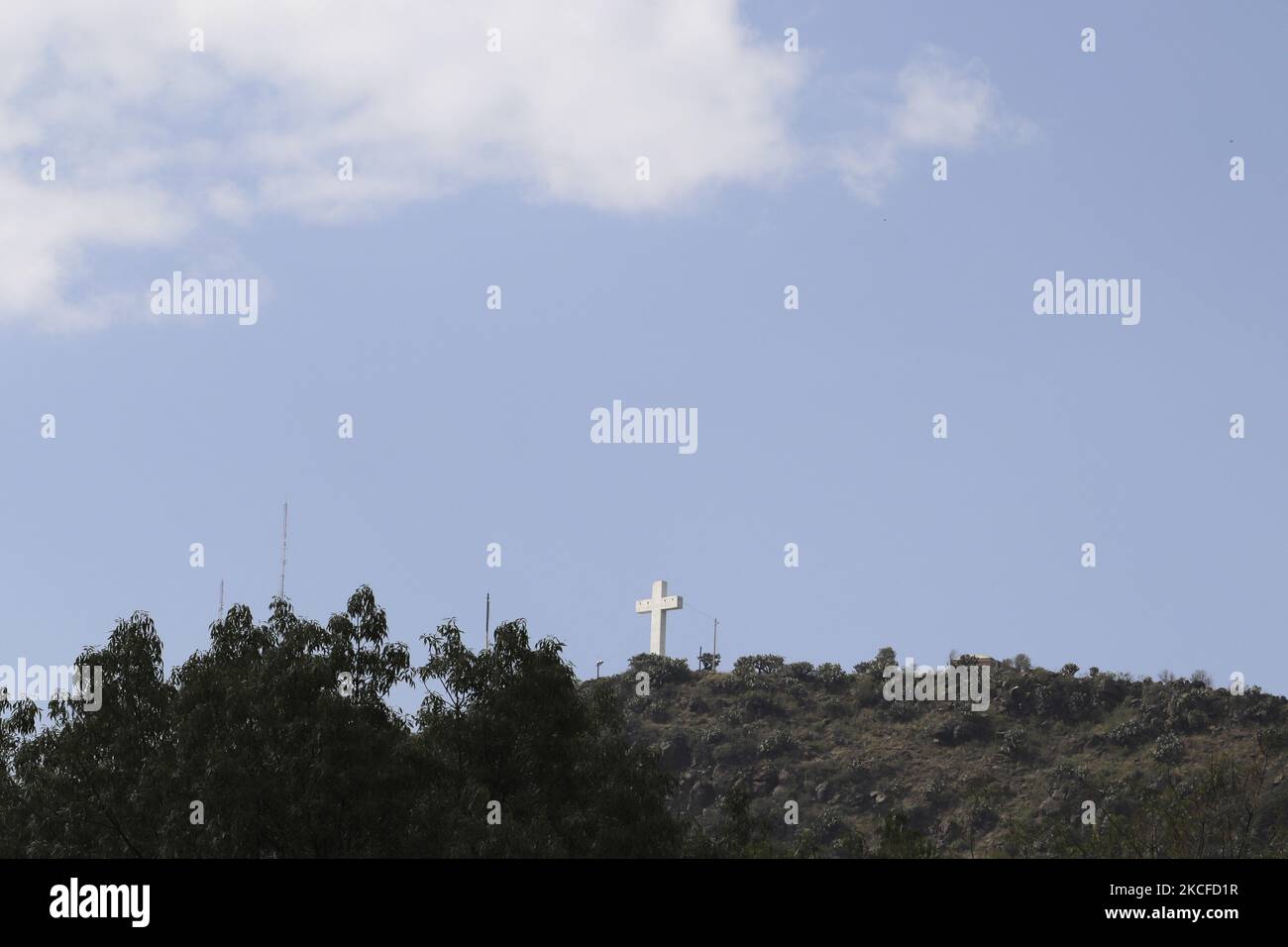 View of a cross on a mountain in the tourist area of El Pica 1, located ...