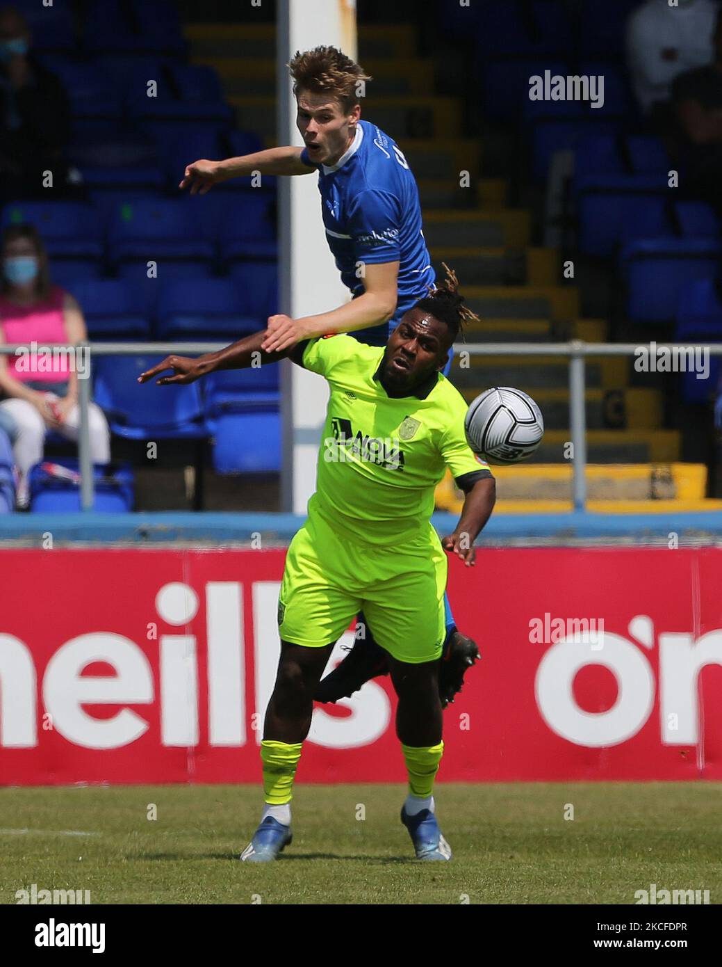 Hartlepool United's Lewis Cass contests a header with Weymouth's Jacob ...