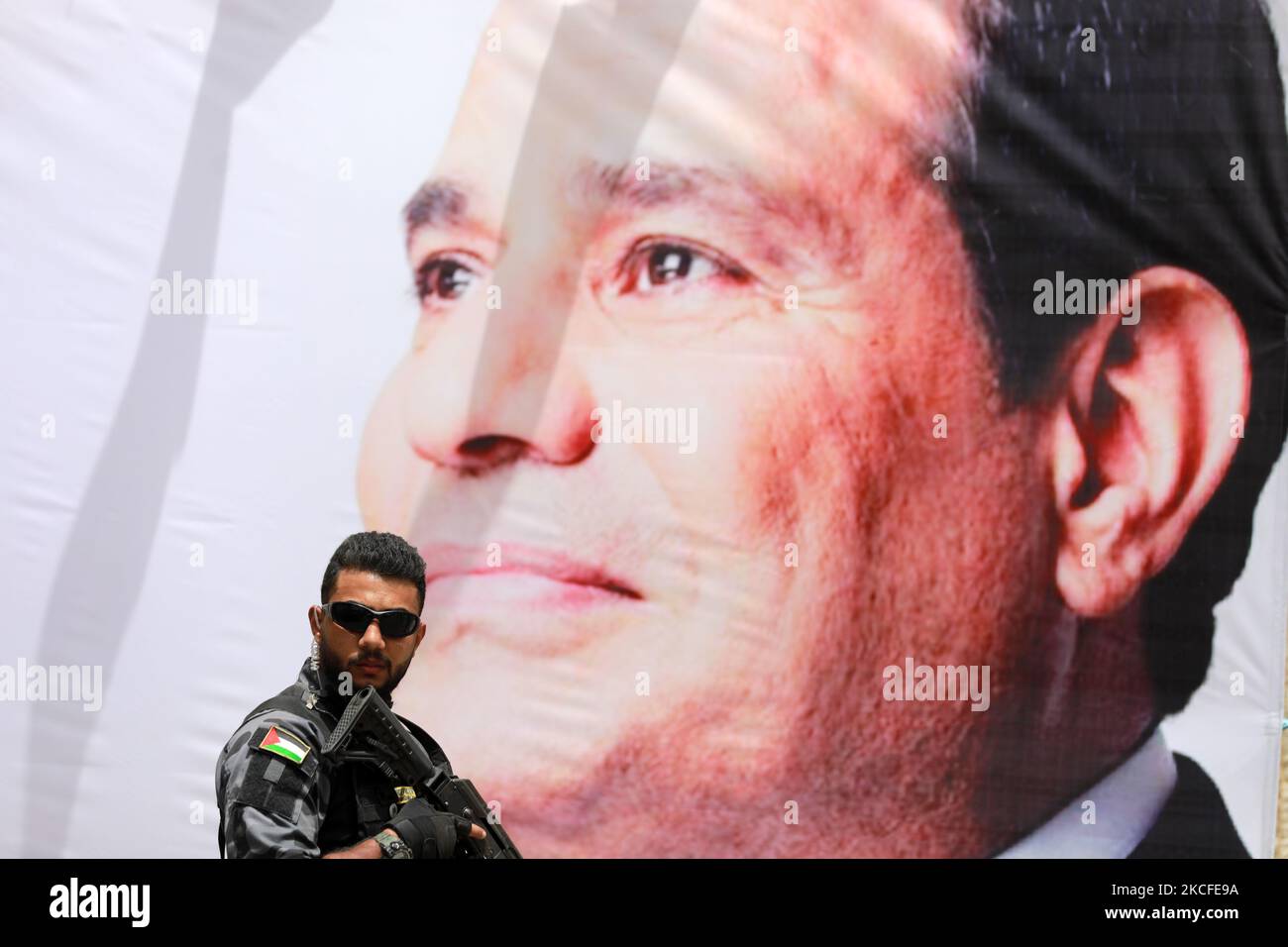 Member of hamas security stands guard hi-res stock photography and ...