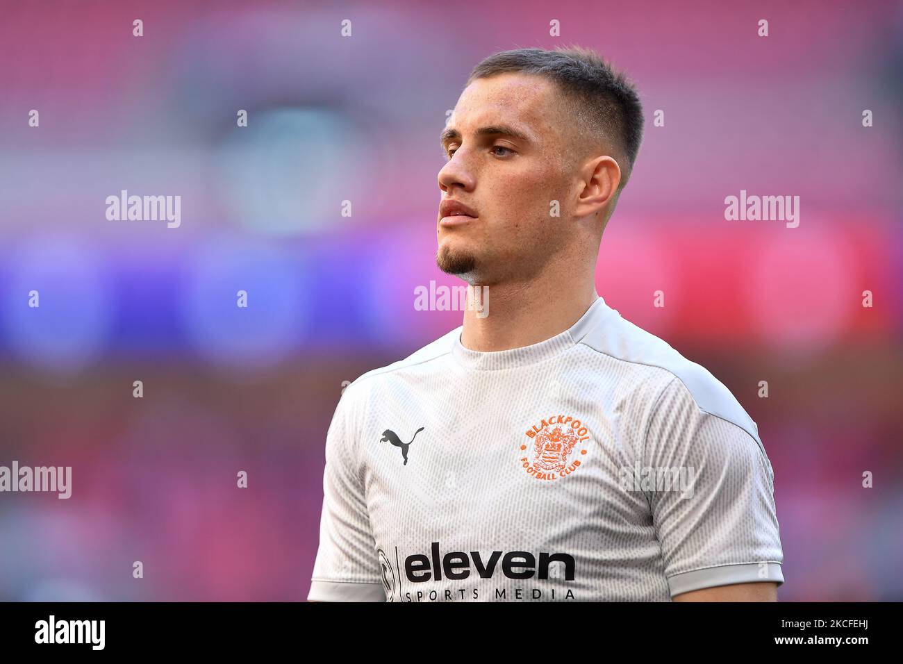Jerry Yates of Blackpool warms up ahead of kick-off during the Sky Bet ...