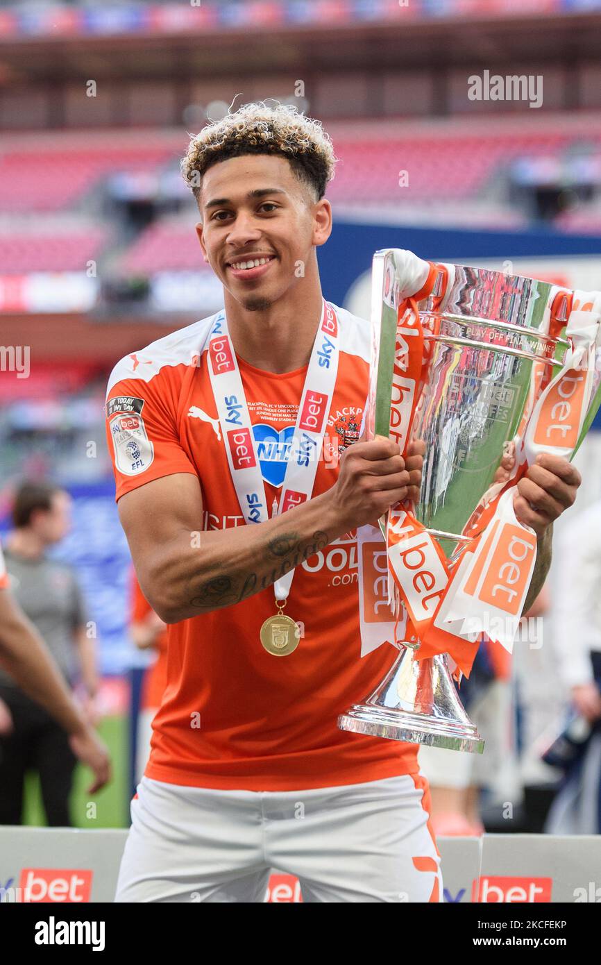 Jordan Gabriel of Blackpool with the winners trophy during the Sky Bet ...