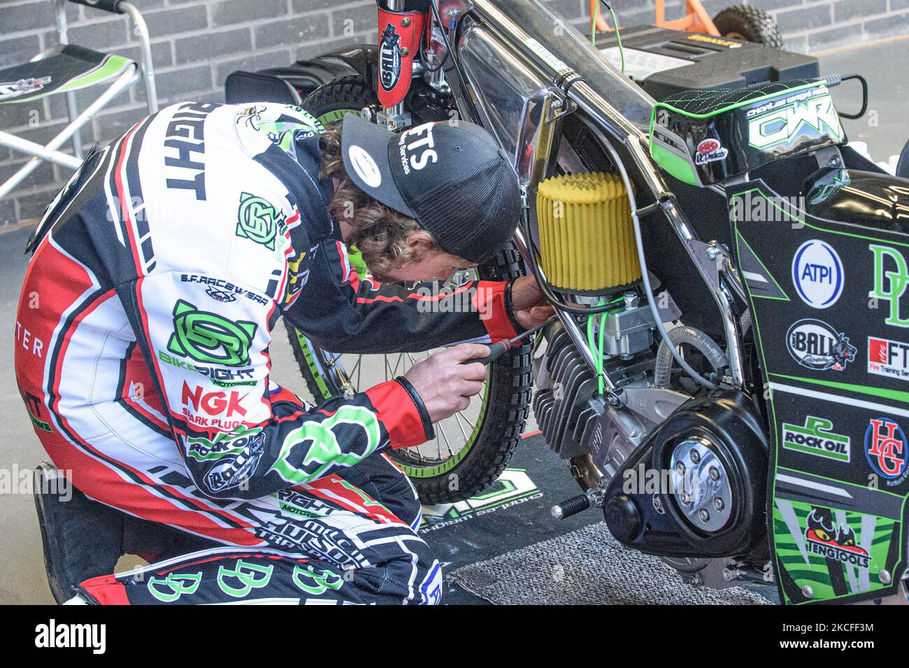 Belle Vue BikeRight Aces rider Charles Wright working on his bike ...