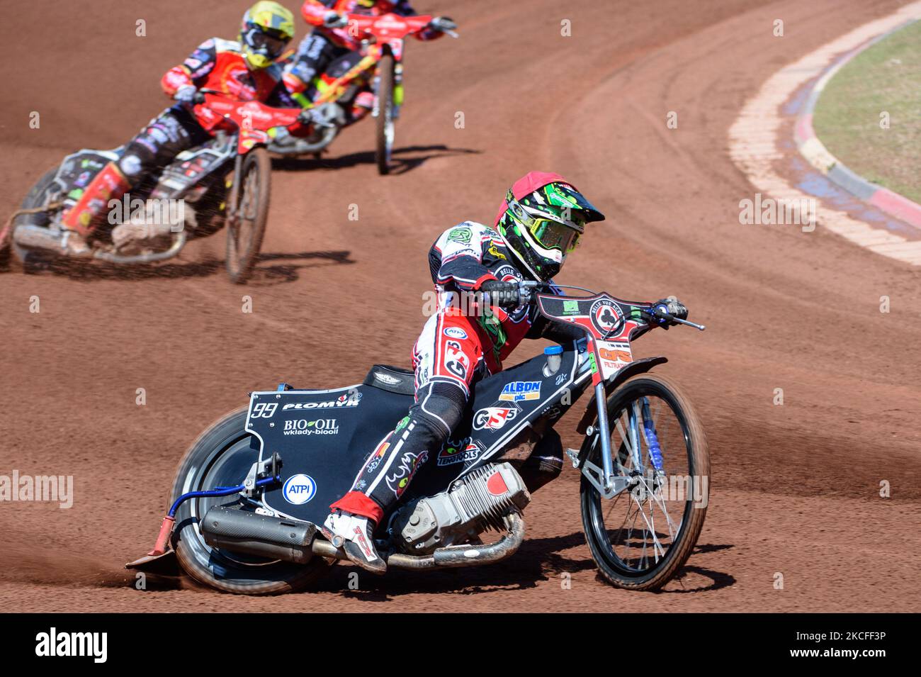Dan Bewley (Red) leads Scott Nicholls (Yellow) during the SGB ...