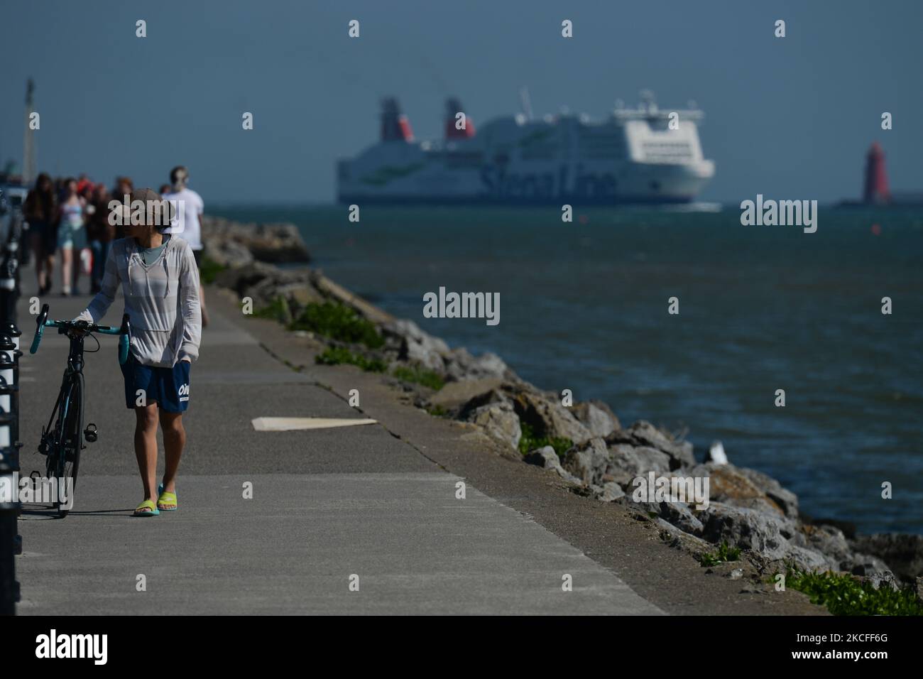 People enjoy nice sunny weather at North Bull Island, in Dublin. On ...