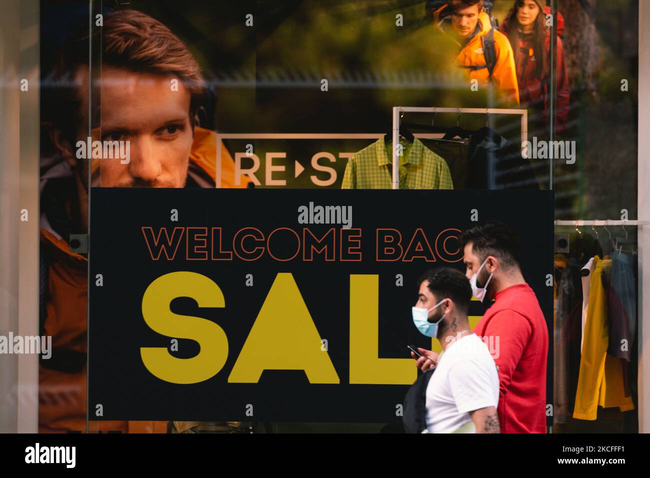 a welcome back sale sign is seen in the city center of Cologne, germany ...