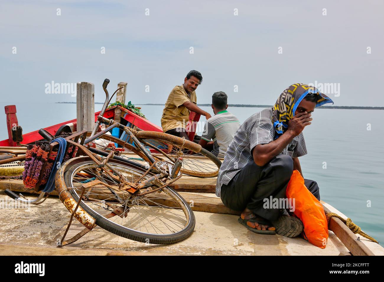 Passengers travel on a ferry boat to Analaitivu Island in the Jaffna region of Sri Lanka. (Photo ...