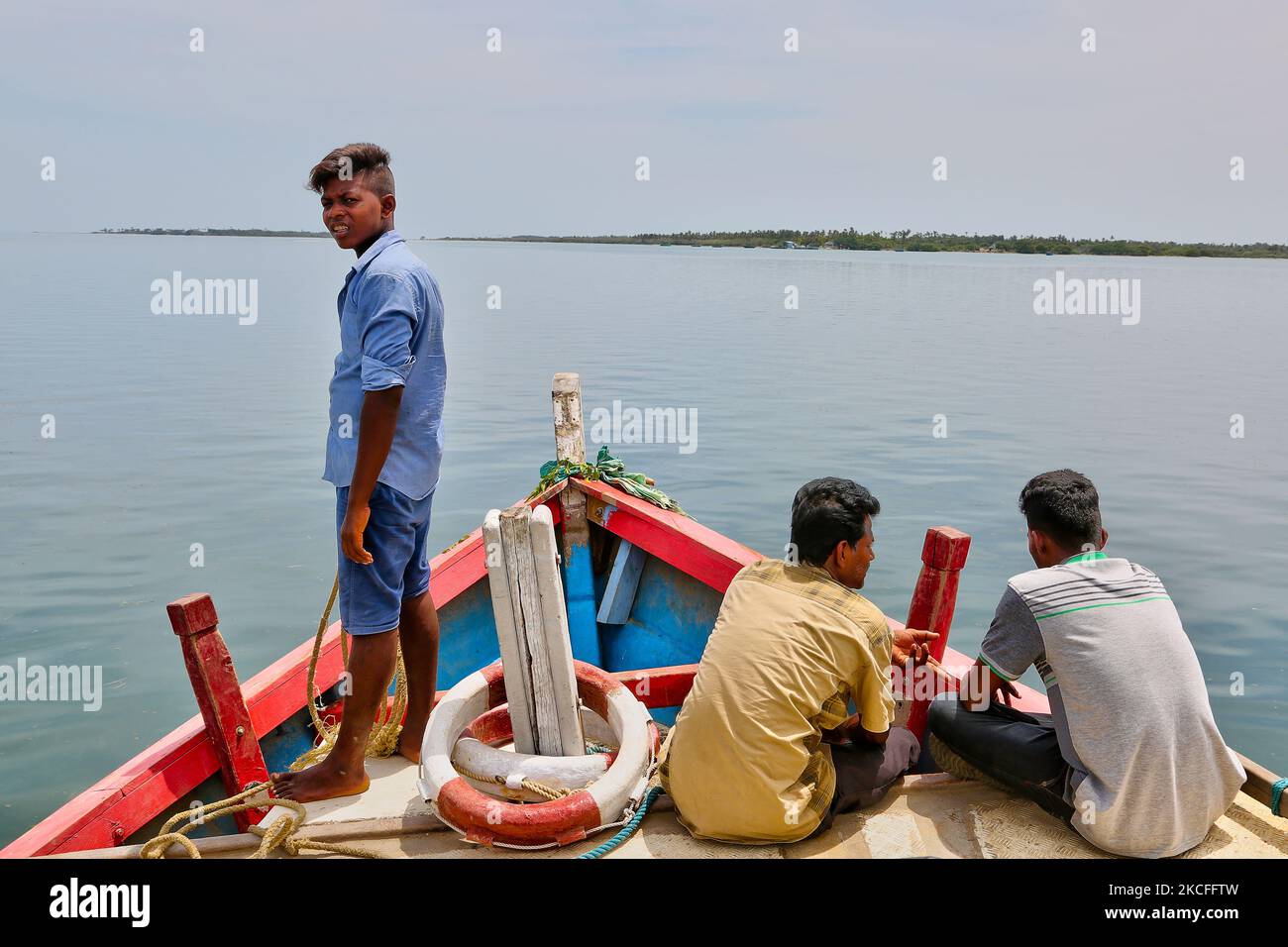 Passengers travel on a ferry boat to Analaitivu Island in the Jaffna region of Sri Lanka. (Photo ...