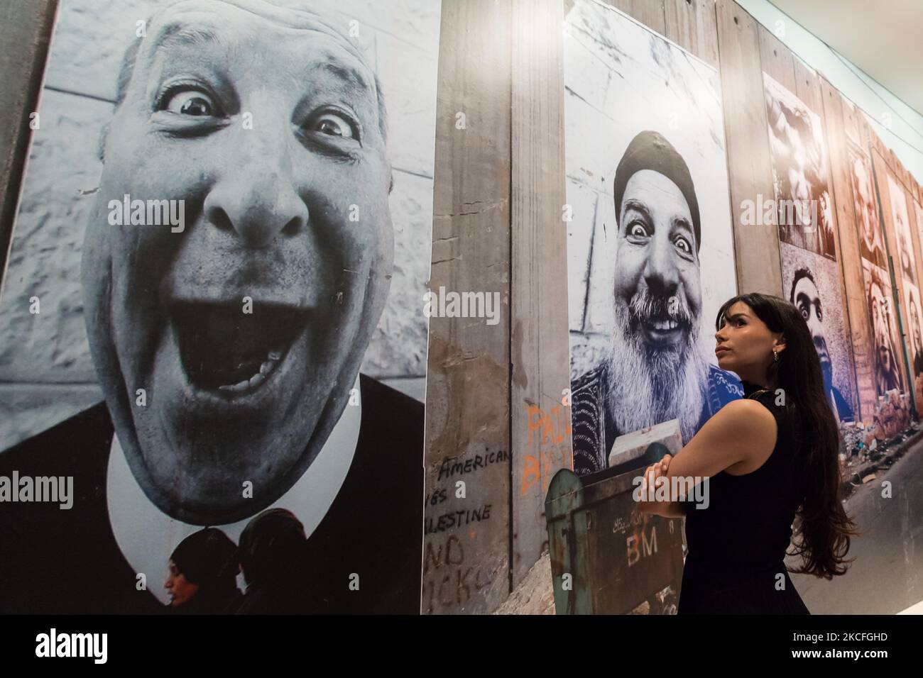 LONDON, UNITED KINGDOM - JUNE 02, 20201: A woman looks at 'Face 2 Face ...