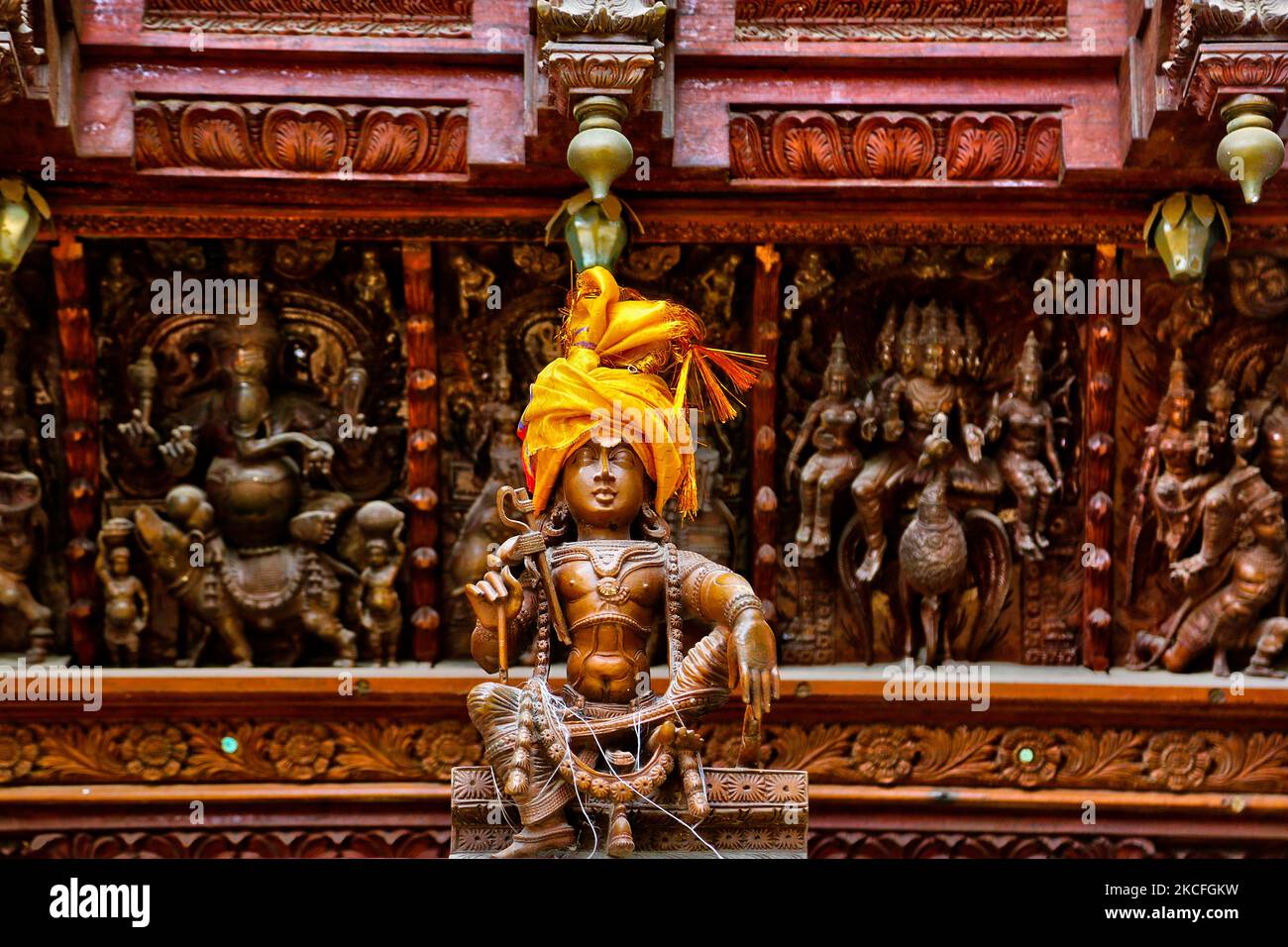 Detailed wooden carvings adorn the large chariot (ther) at the Ayyanar ...