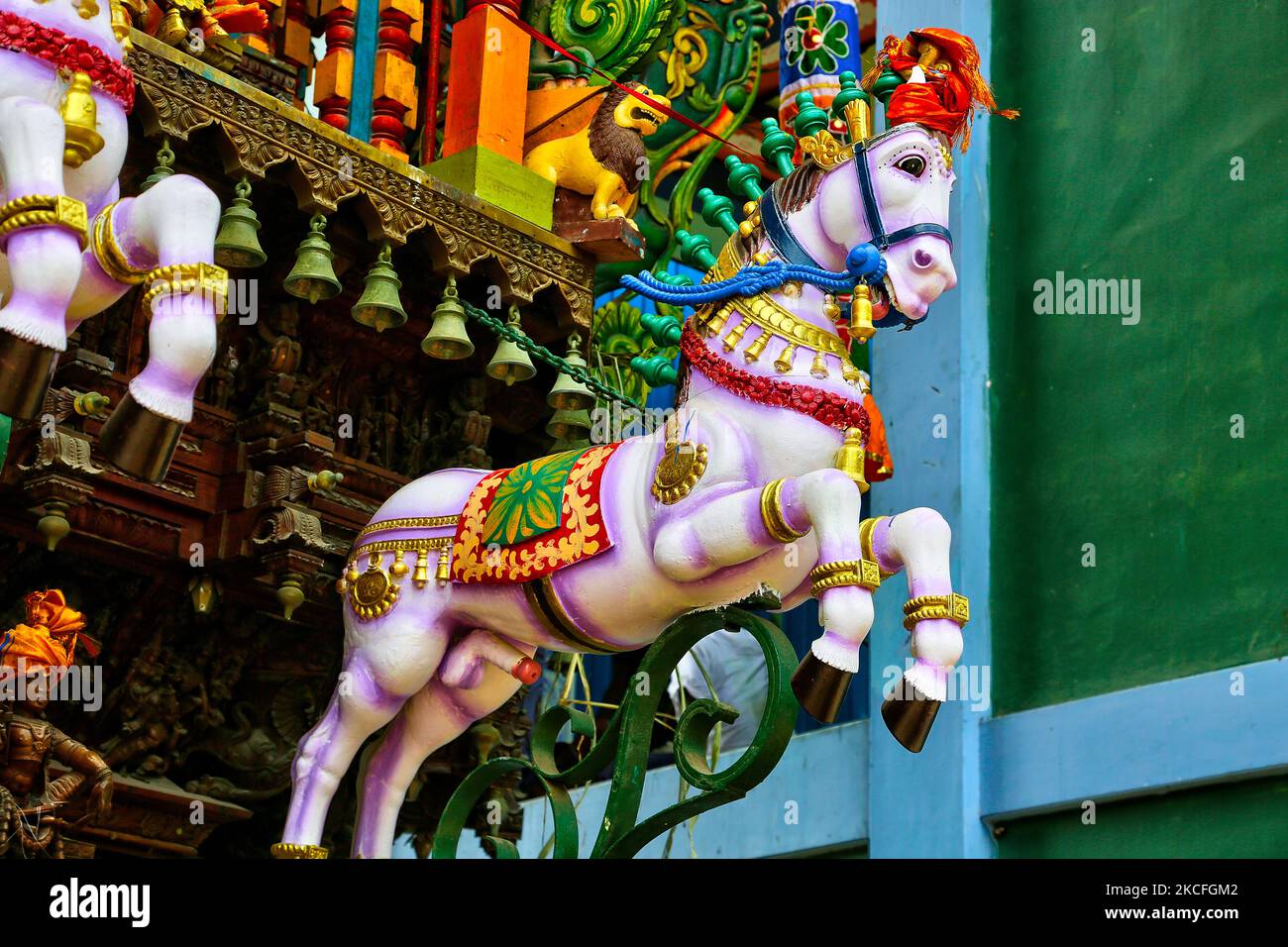 Horses adorn the large wooden chariot (ther) at the Ayyanar Kovil ...