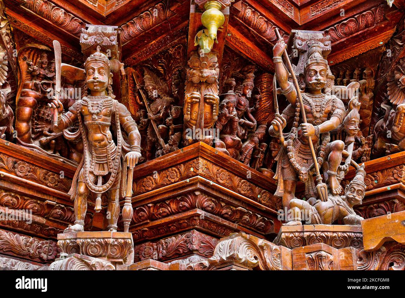Detailed wooden carvings adorn the large chariot (ther) at the Ayyanar ...