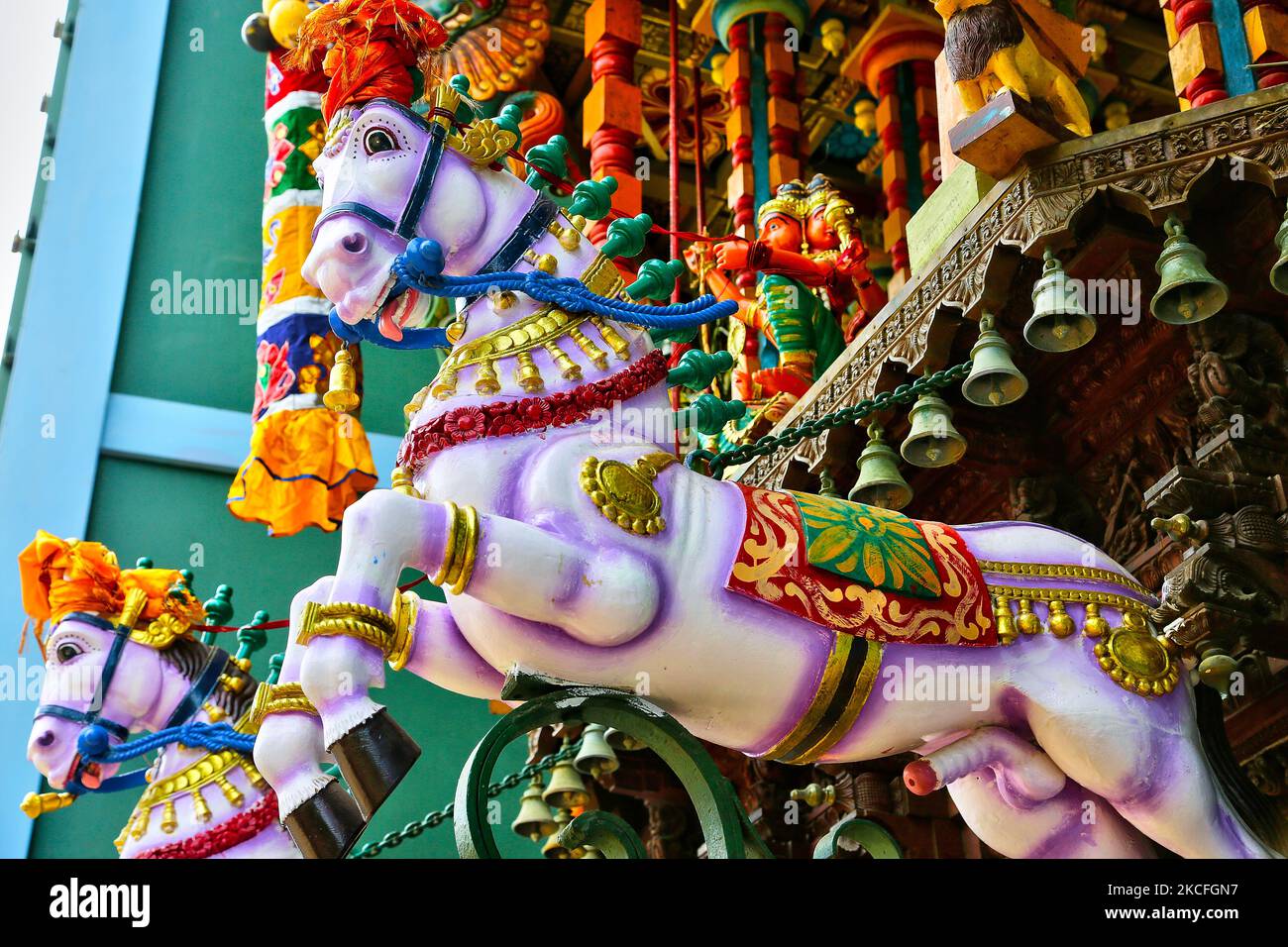 Horses adorn the large wooden chariot (ther) at the Ayyanar Kovil ...