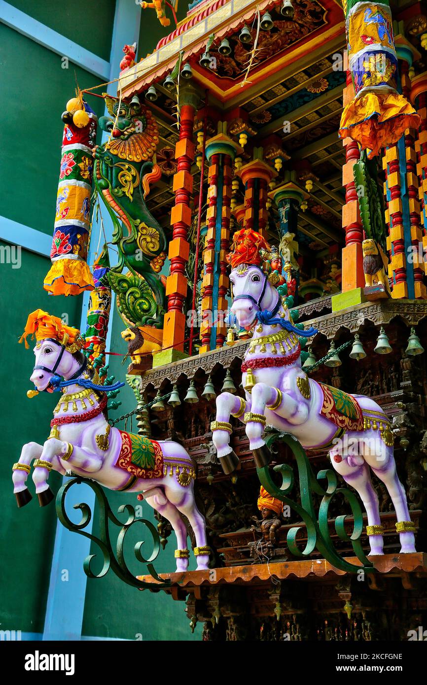 Horses adorn the large wooden chariot (ther) at the Ayyanar Kovil ...