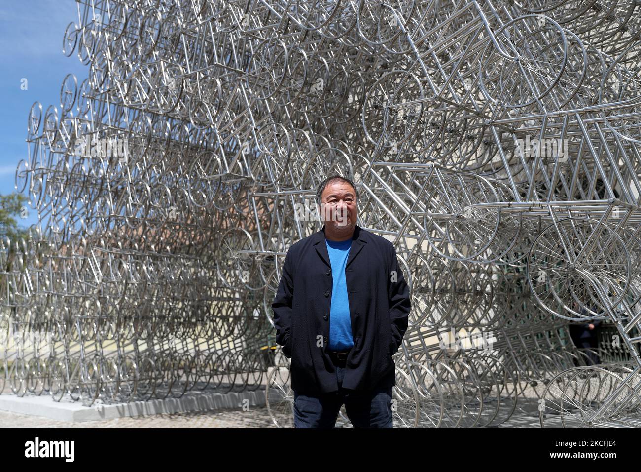 Chinese artist Ai Weiwei poses in front of his sculpture "Forever ...