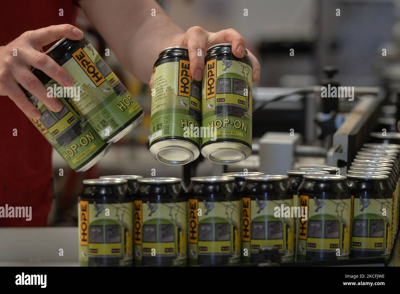 Beer canning line at the Hope Brewery in Dublin. Pubs and restaurants ...