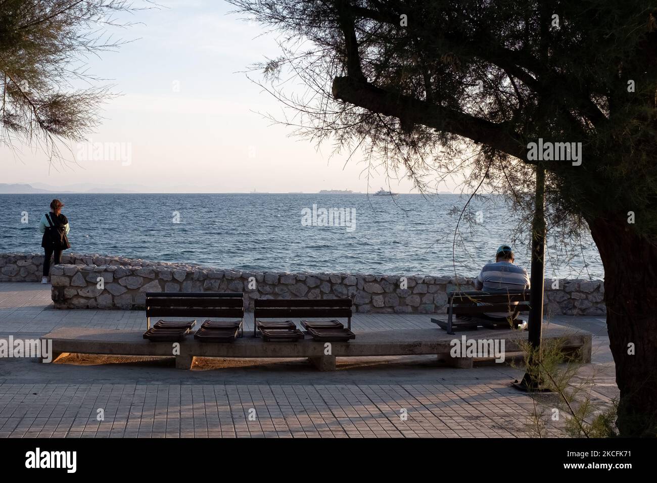 Locals and tourists enjoy the fine weather as they spend the day on the ...